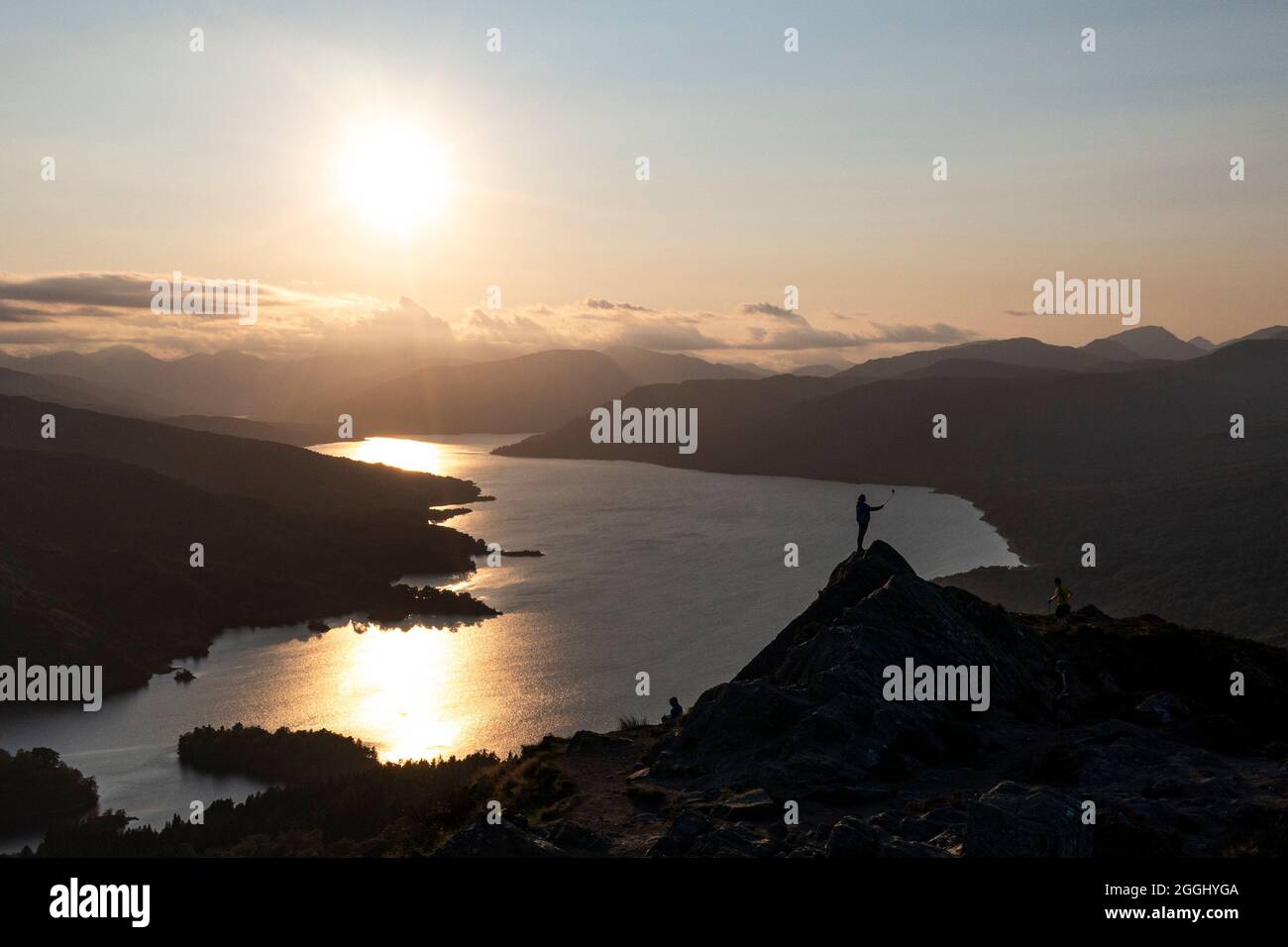 Ben An’a summit, Scotland, 26 August 2021. Pictured: A silhouetted ...