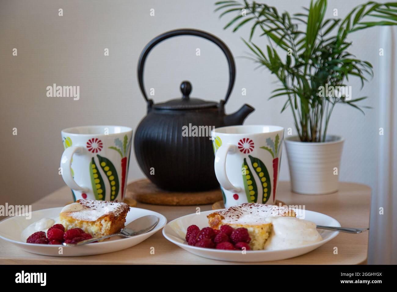 Closeup. Swedish cheese cake with fresh raspberry and whipped cream on ...