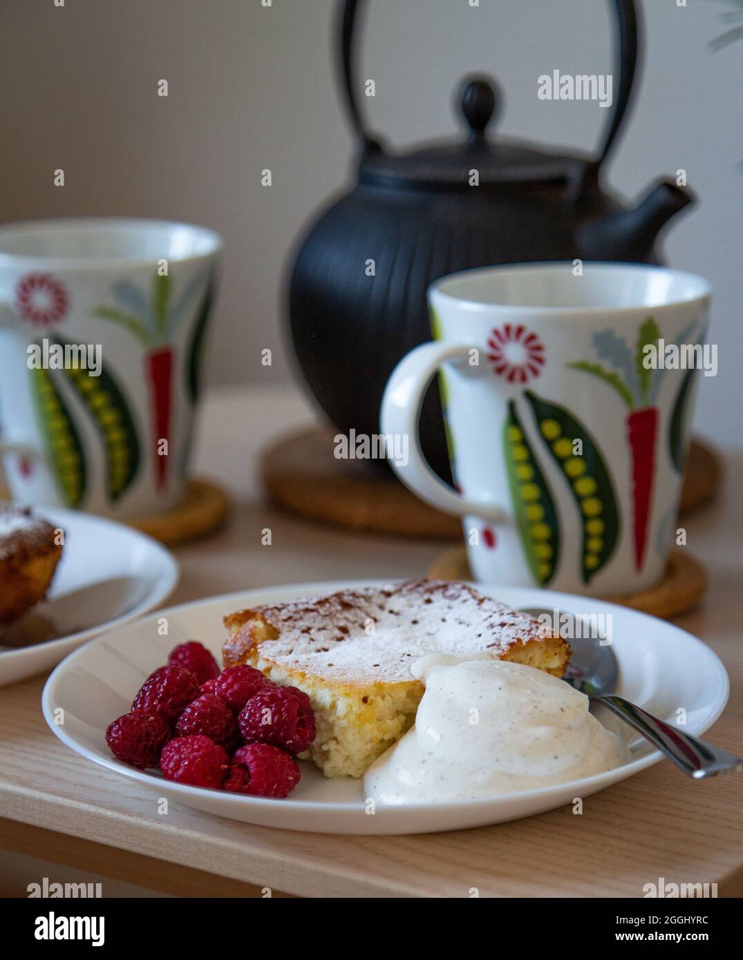 Closeup. Swedish cheese cake with fresh raspberry and whipped cream on ...