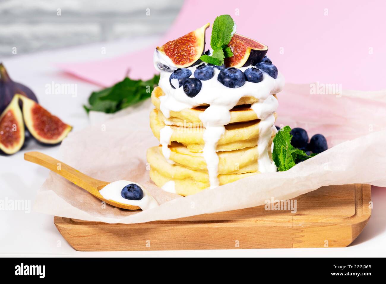Pancakes With Blueberry, Figs, Yoghurt and Mint on white background ...