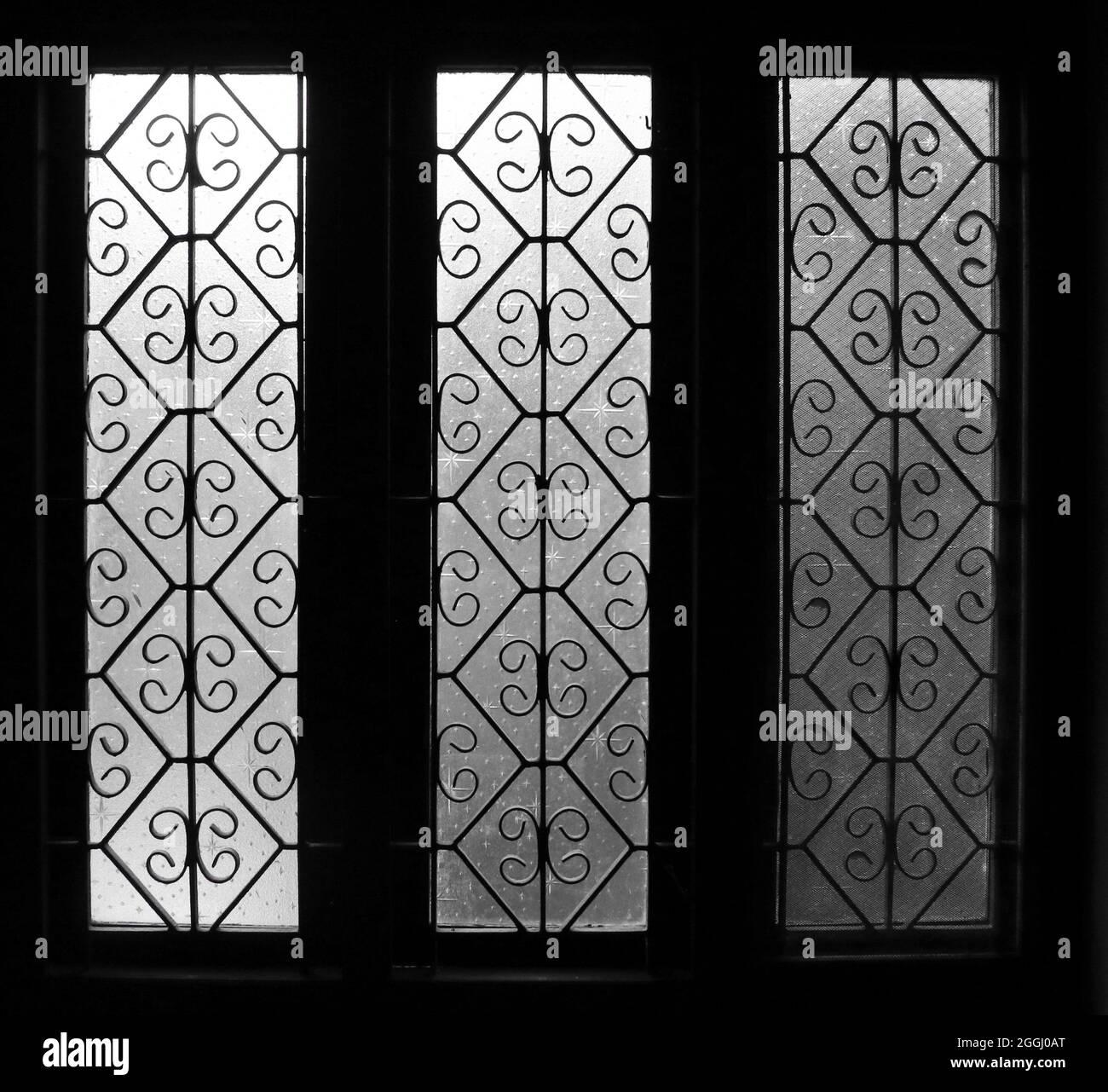 light gradient on three translucent glasses of identical windows with ...