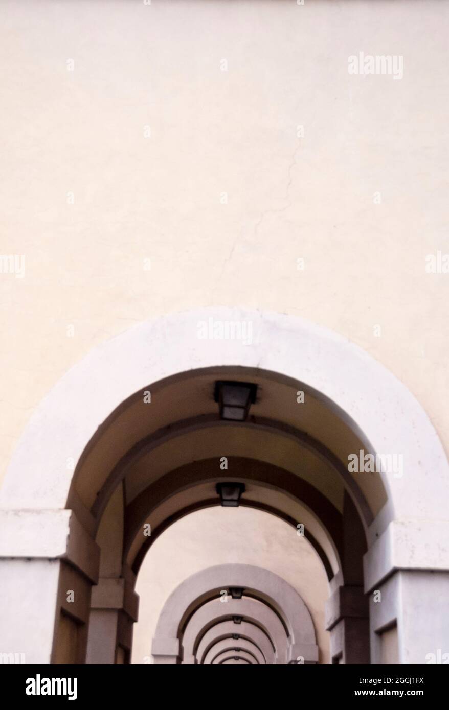 Repeating arches of the Vasari Corridor covered walkway in Florence ...