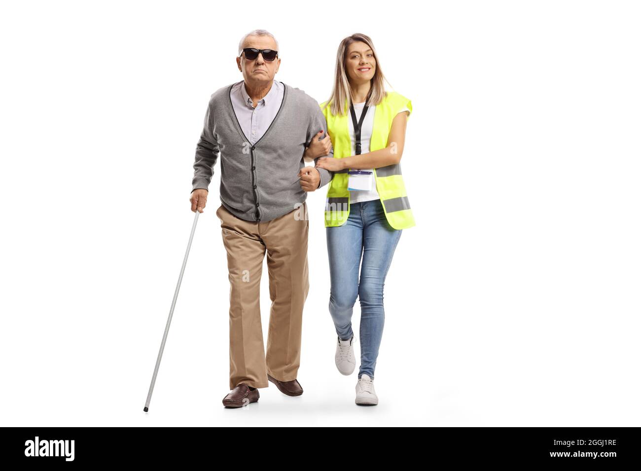 Full length portrait of a female community worker helping an elderly ...