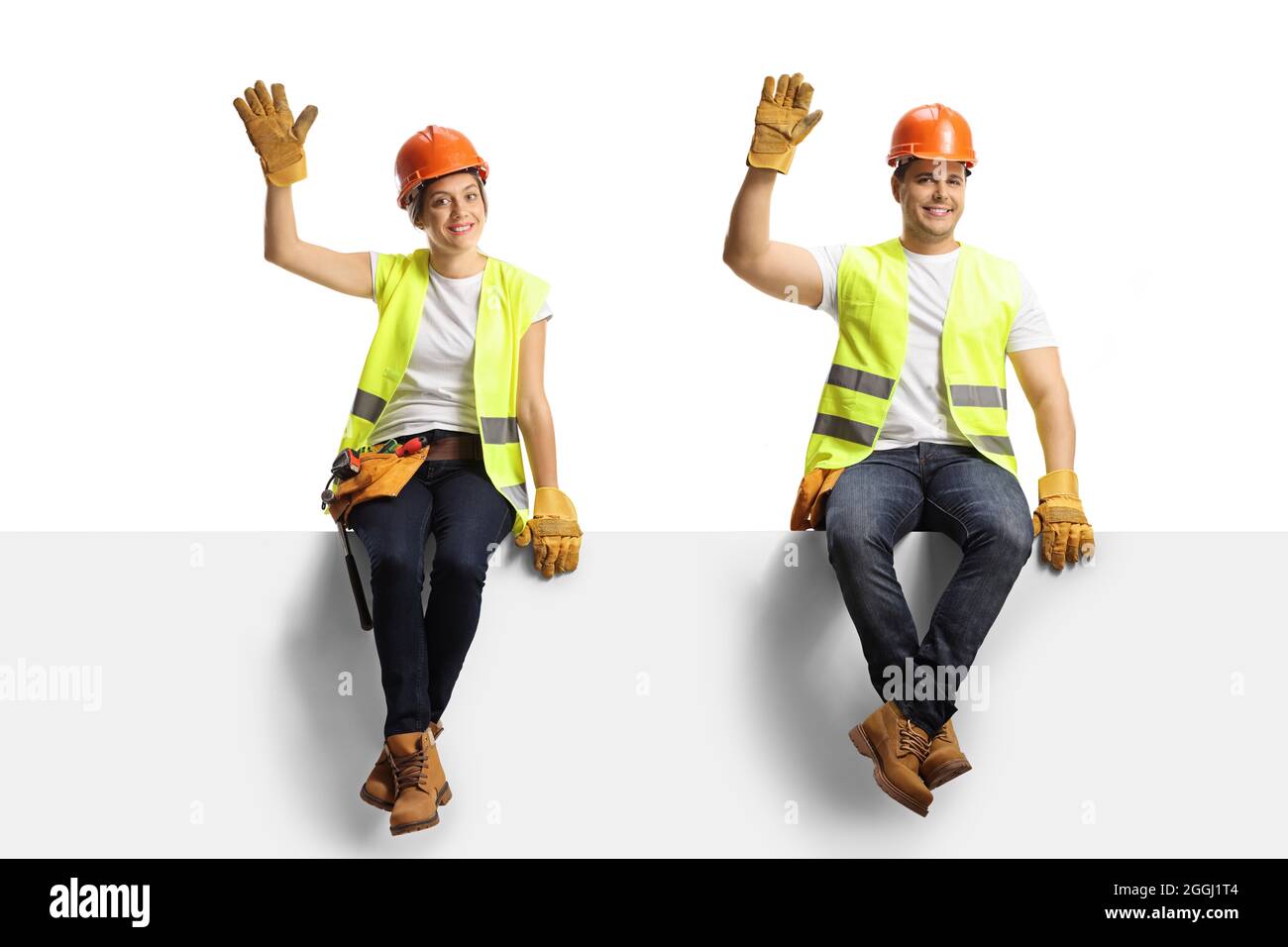 Male and female construction workers sitting on a panel and waving isolated on white background ...