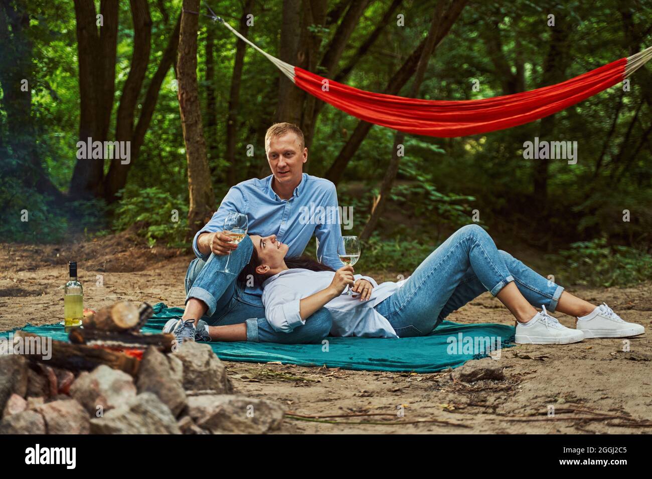 Happy couple enjoying time together in nature Stock Photo - Alamy