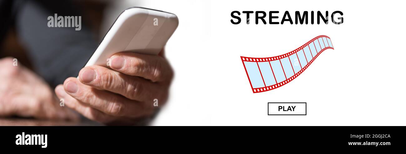 Hand holding mobil phone with video streaming concept on background ...