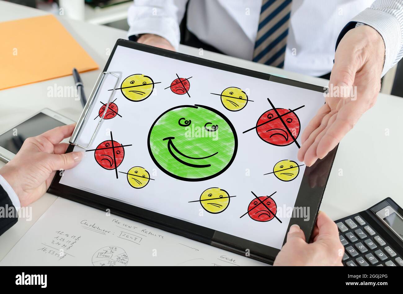 Customer satisfaction concept shown by a businessman Stock Photo - Alamy