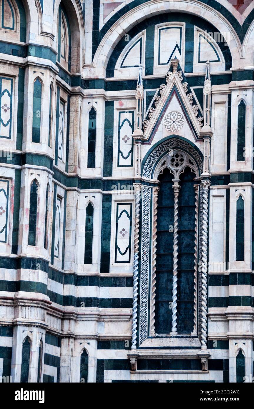 Trefoil pointed arched Gothic windows with twisted columns and ...