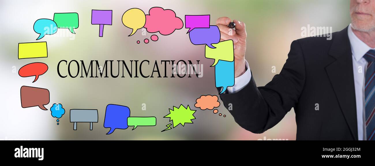 Businessman drawing a communication concept Stock Photo - Alamy