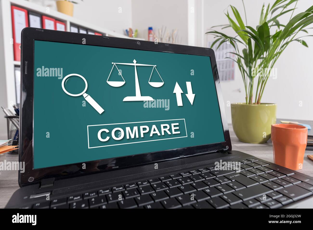 Laptop screen with compare concept Stock Photo - Alamy