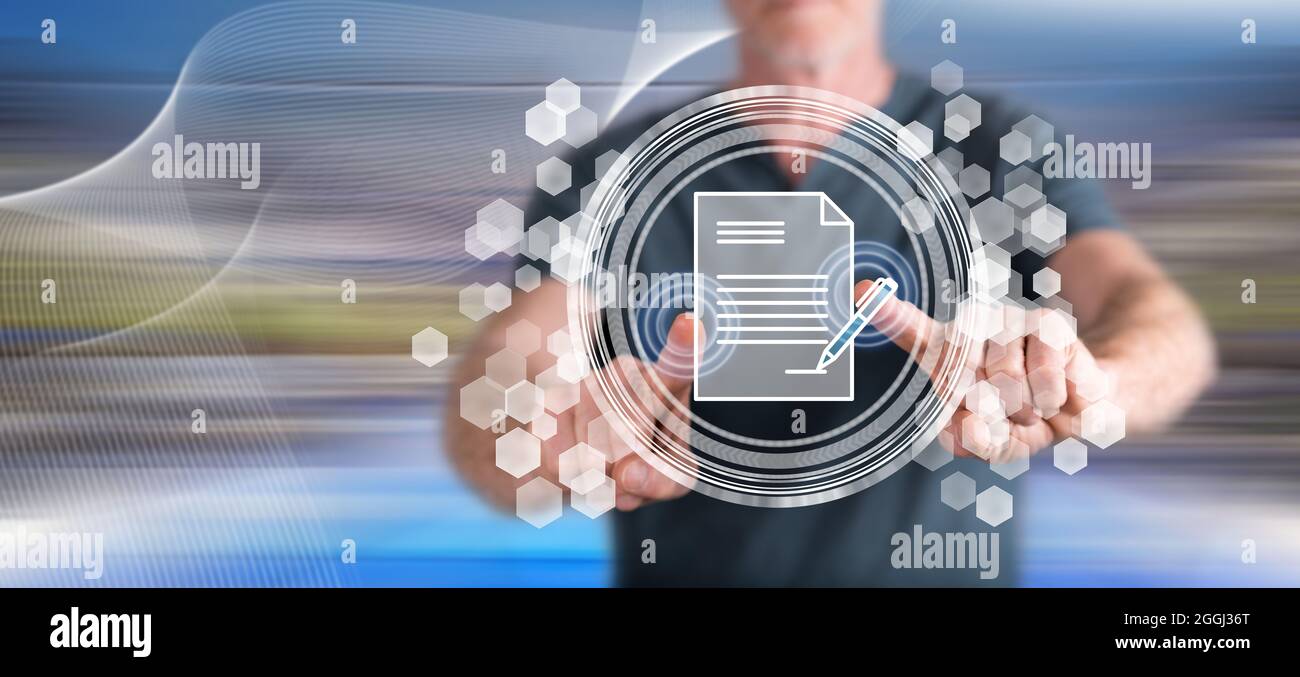 Man touching a smart contract concept on a touch screen with his ...