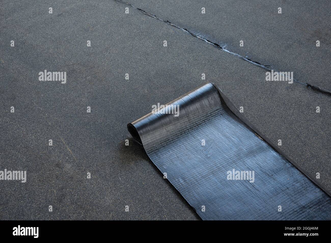New roof bitumen membrane insulation Stock Photo - Alamy