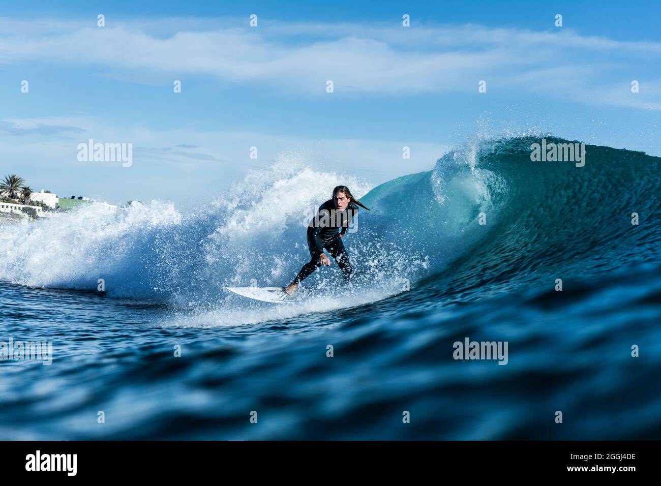 Blue surfer hi-res stock photography and images - Alamy