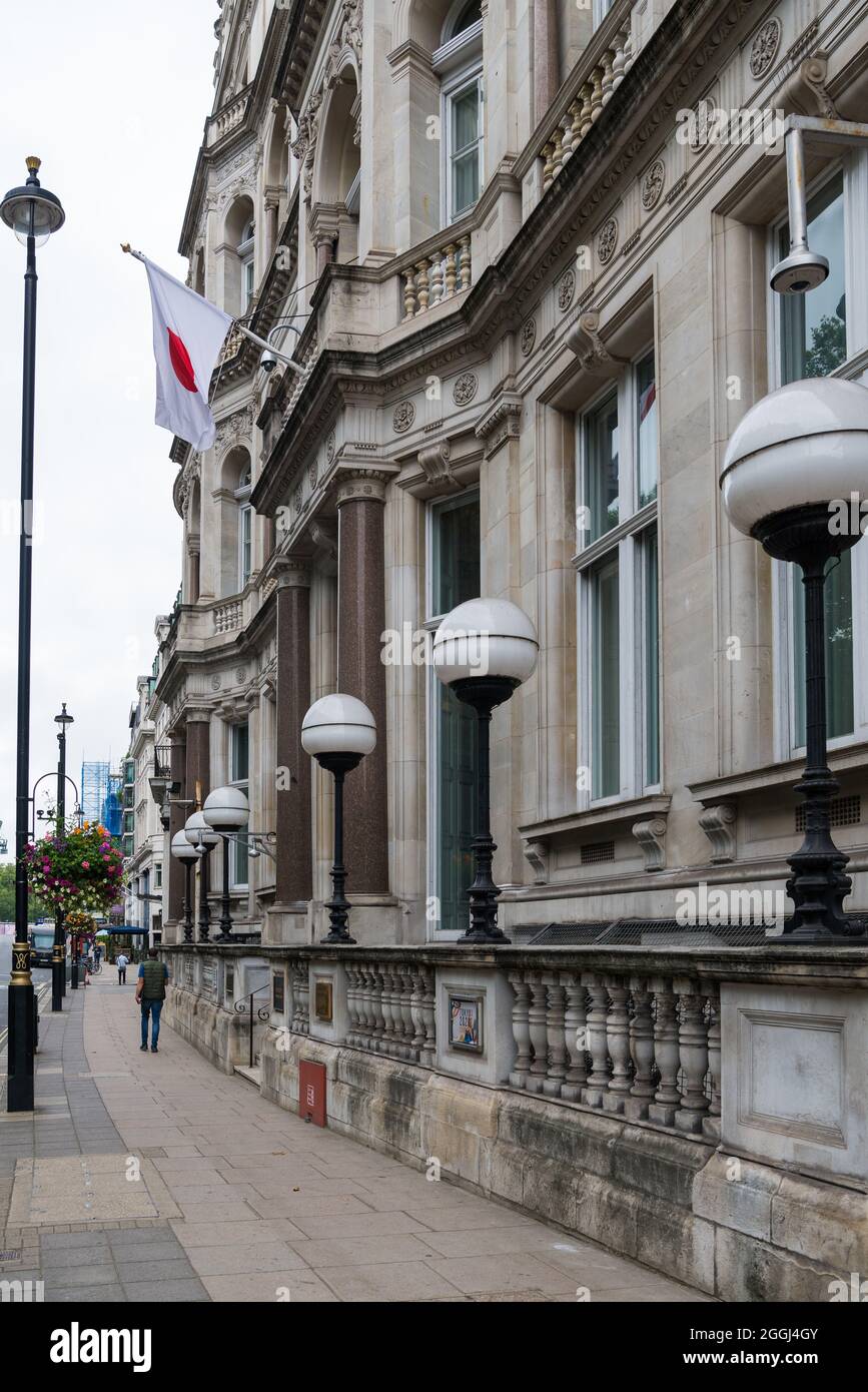 View west along Piccadilly outside the Embassy of Japan. Japanese ...