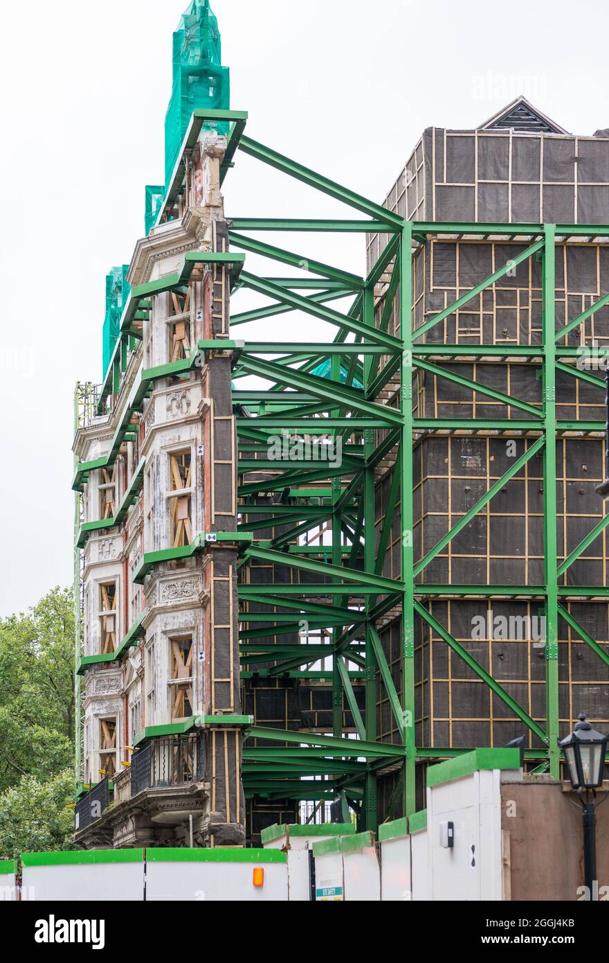 Steelwork supporting the retained facade of an old demolished building ...