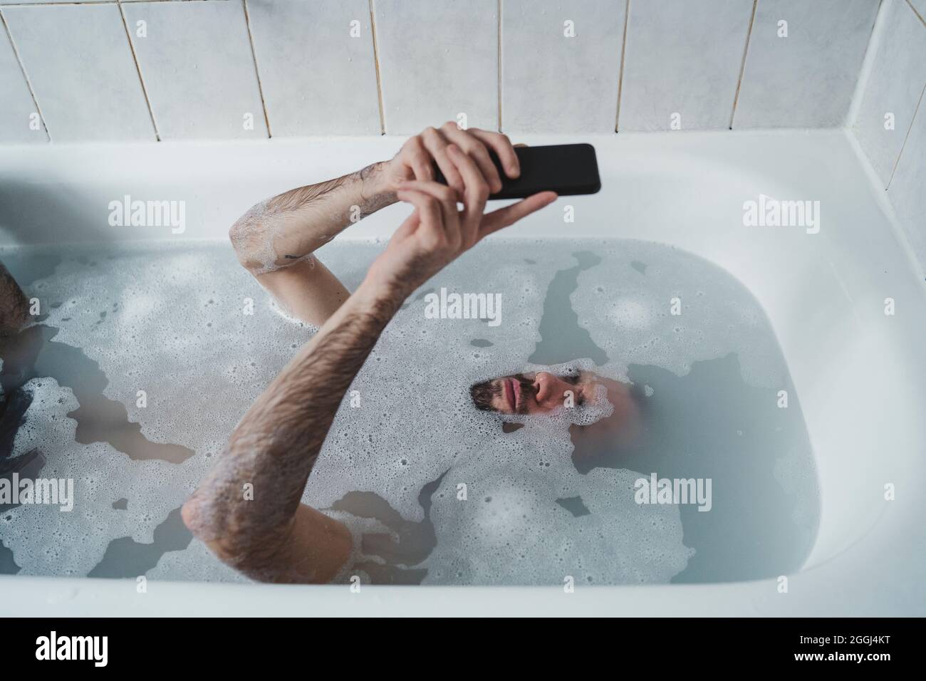 Man in shower crying hi-res stock photography and images - Alamy