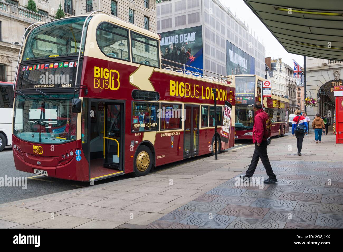 Big Bus London tour buses waiting to pick up passengers at bus stand in ...