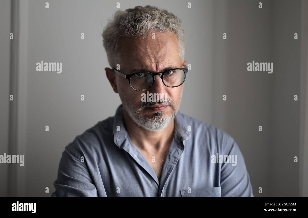 portrait of angry Iranian man Stock Photo - Alamy