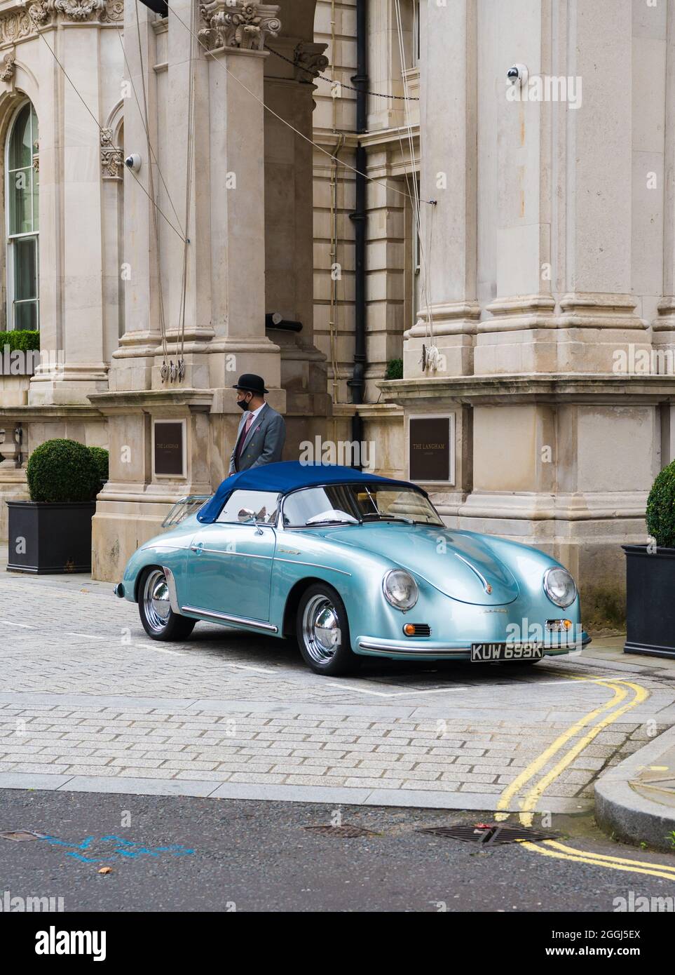 Light blue convertible Porsche Speedster (possibly a 356?) sports car ...