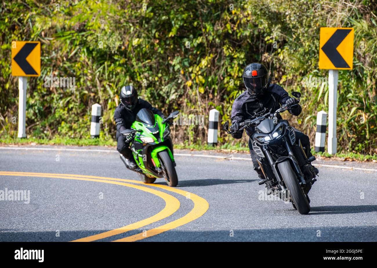 two friends riding their motorcycles in north Thailand Stock Photo - Alamy