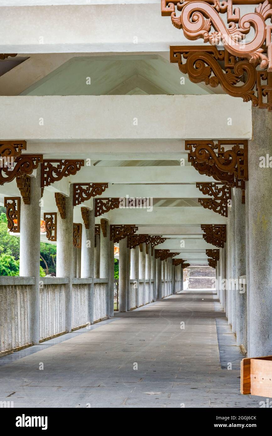 Close-up of long walkway in the park Stock Photo - Alamy