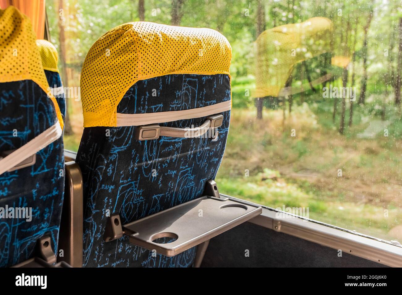 Back of seat with handle for hands in public transport bus Stock Photo ...