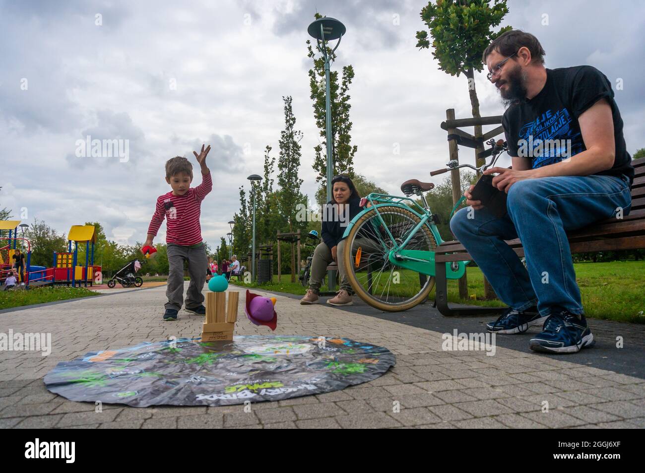 POZNAN, POLAND - Aug 29, 2021: A Young boy throwing with balls of a ...