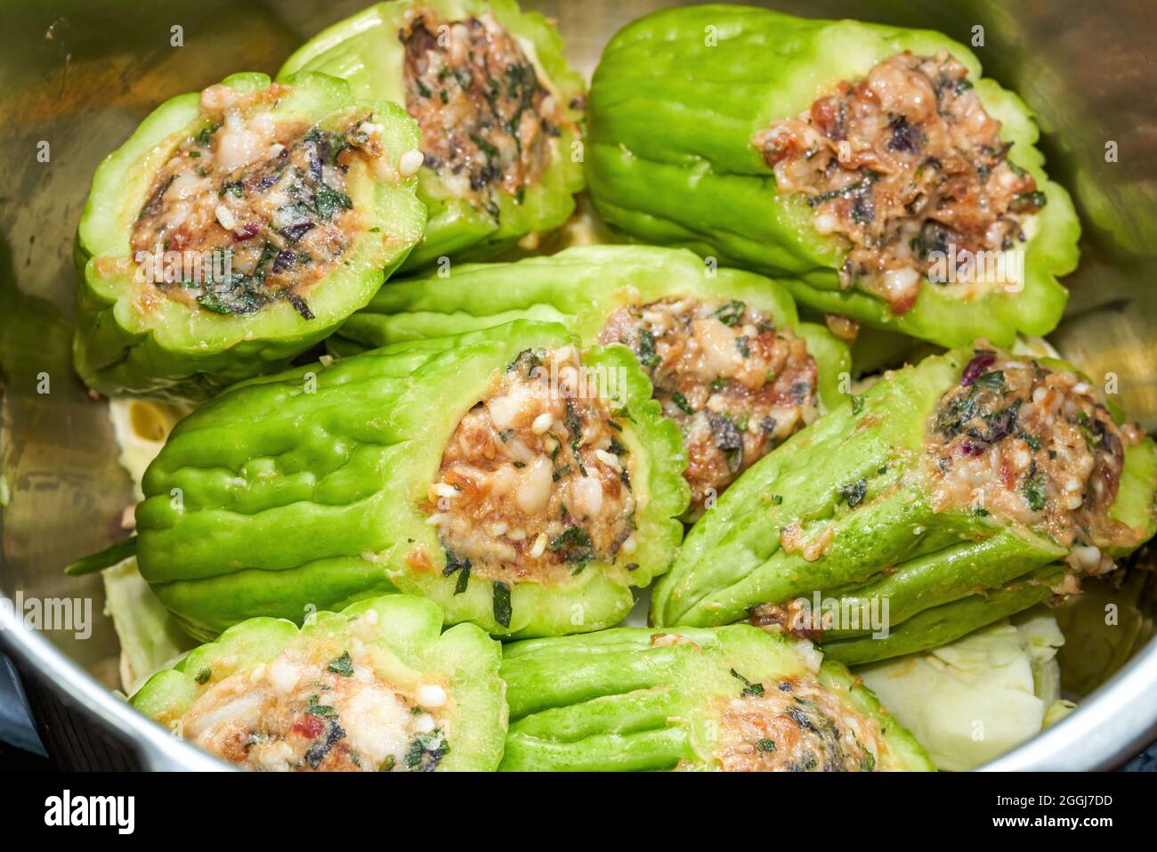 Chinese Guangxi traditional dish, bitter gourd stuffed with meat close ...