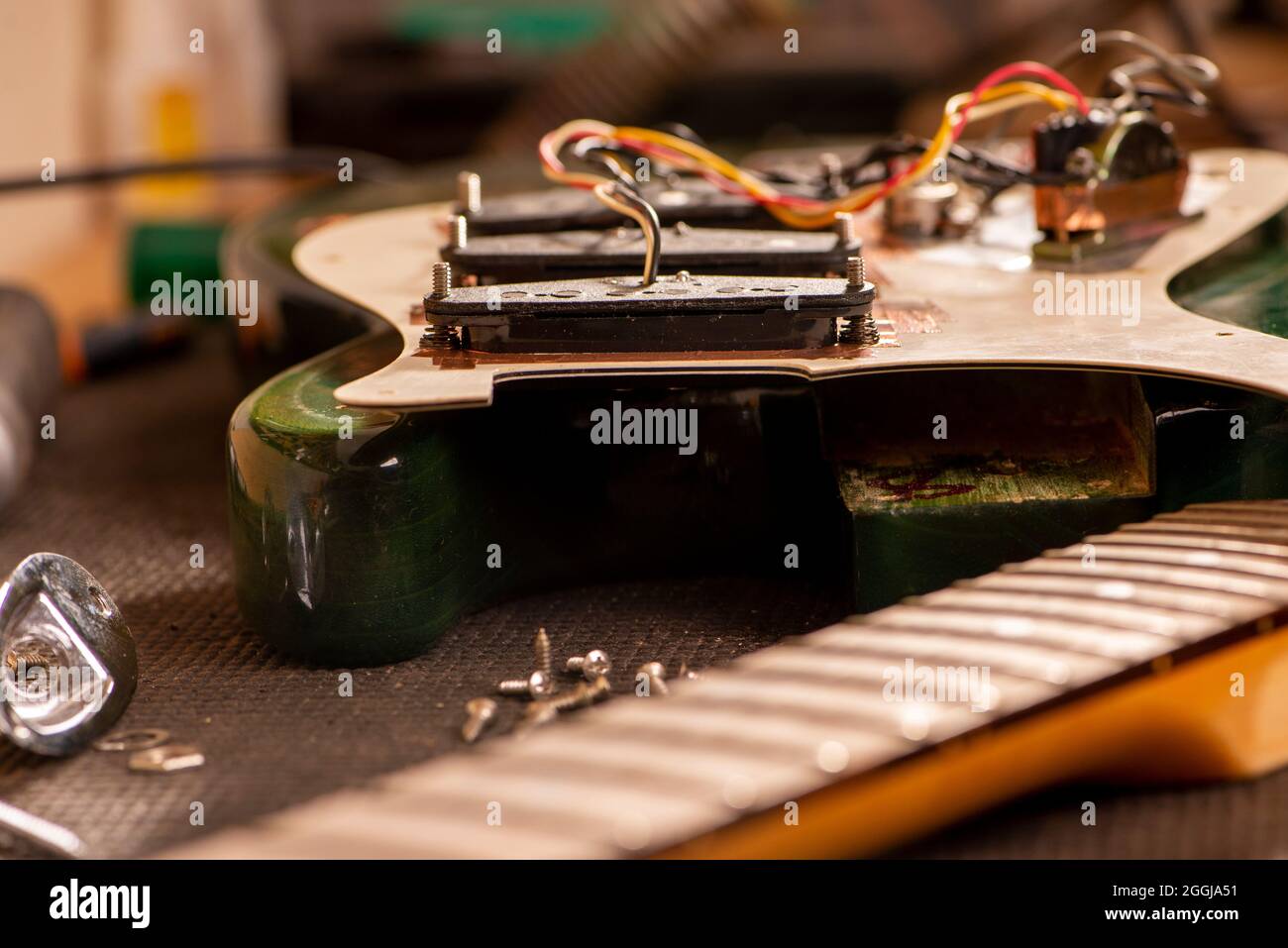 body part of a guitar and some parts Stock Photo - Alamy