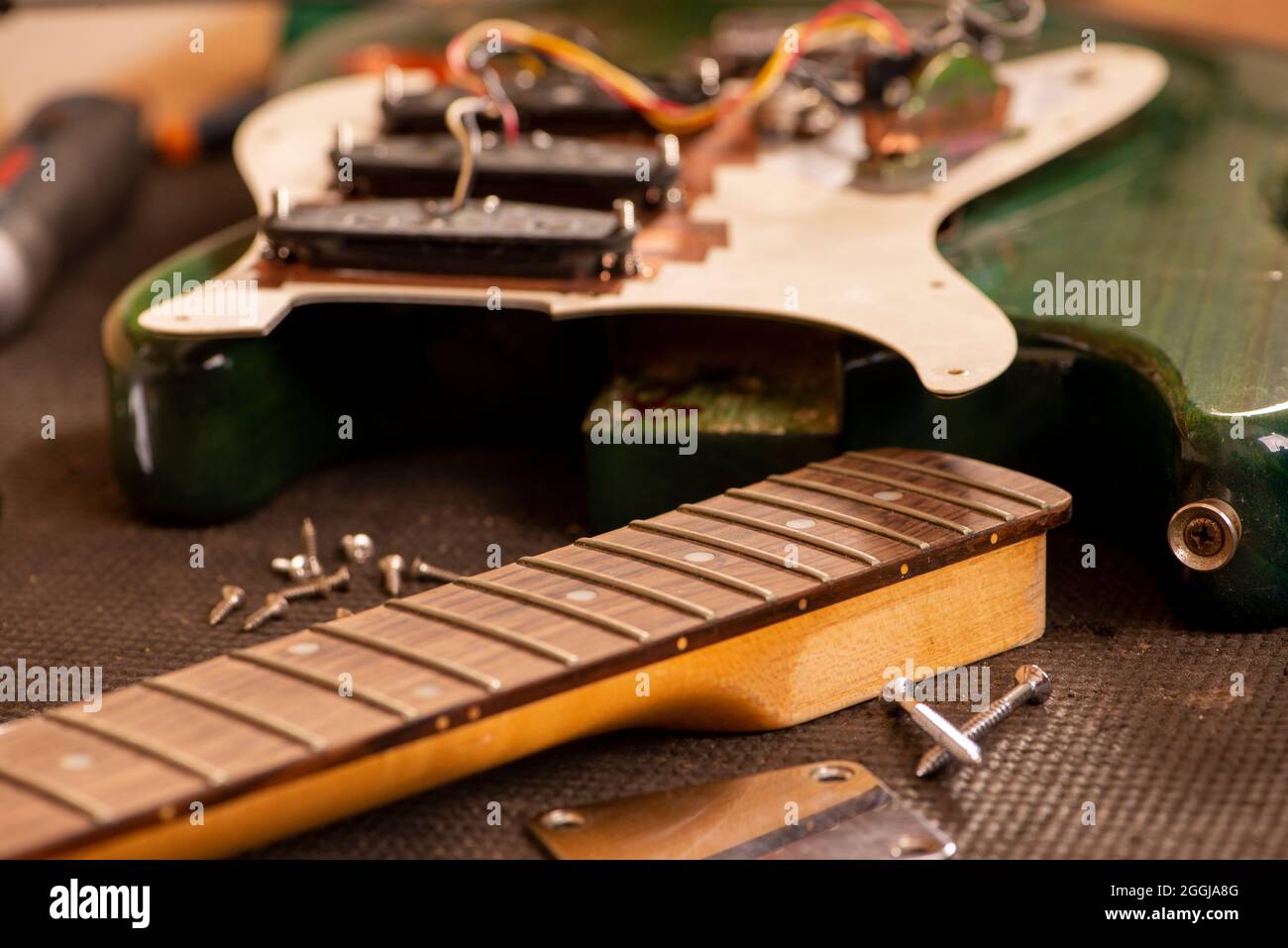 body part of a guitar and some parts Stock Photo - Alamy