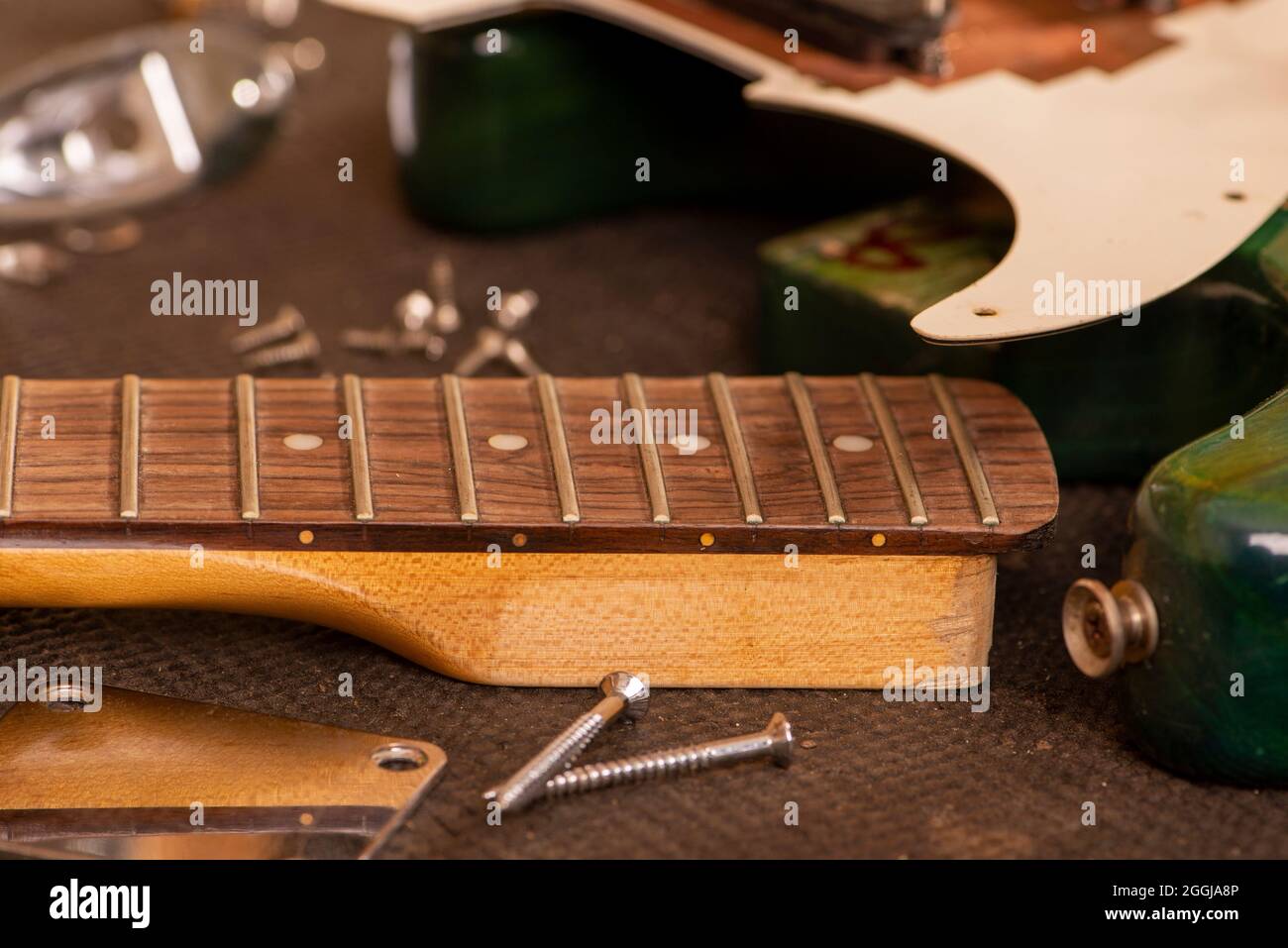 body part of a guitar and some parts Stock Photo - Alamy