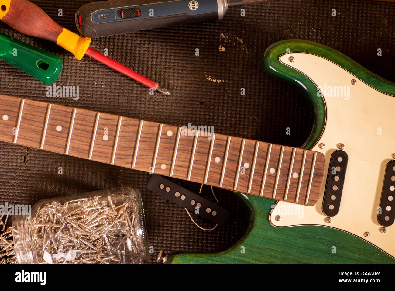 body part of a guitar and some parts Stock Photo - Alamy