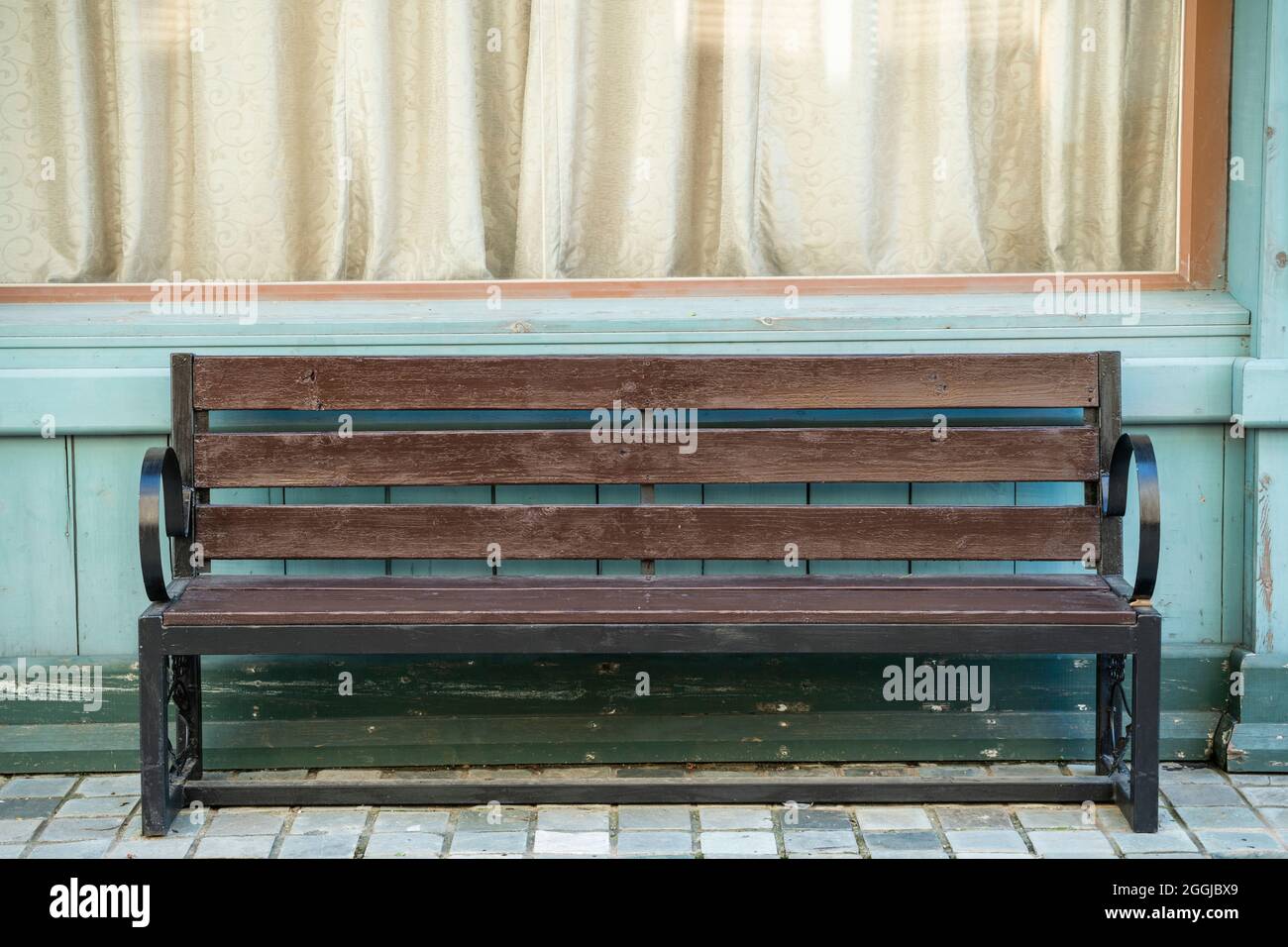 wooden bench in the street Stock Photo - Alamy