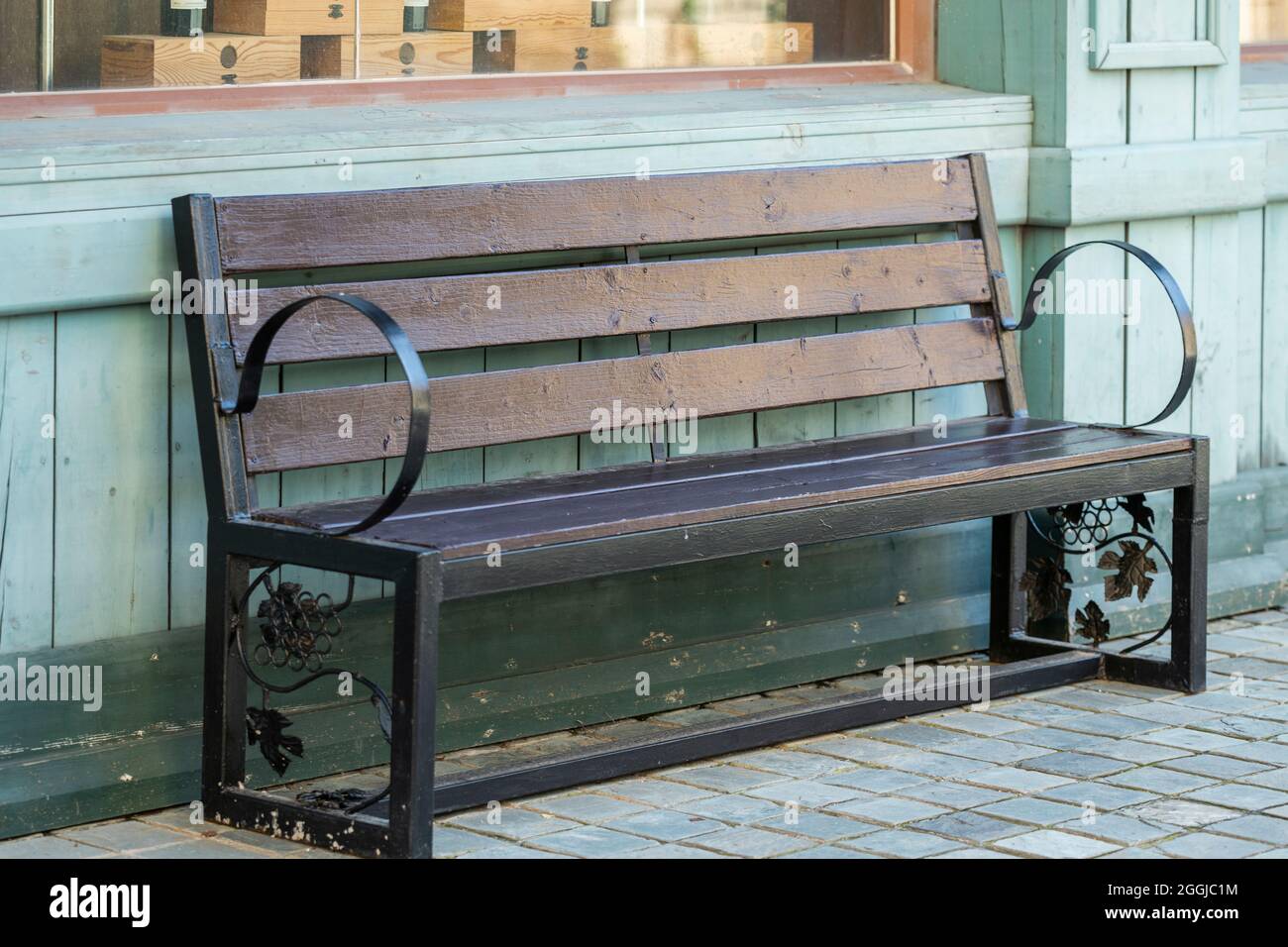 wooden bench in the street Stock Photo - Alamy