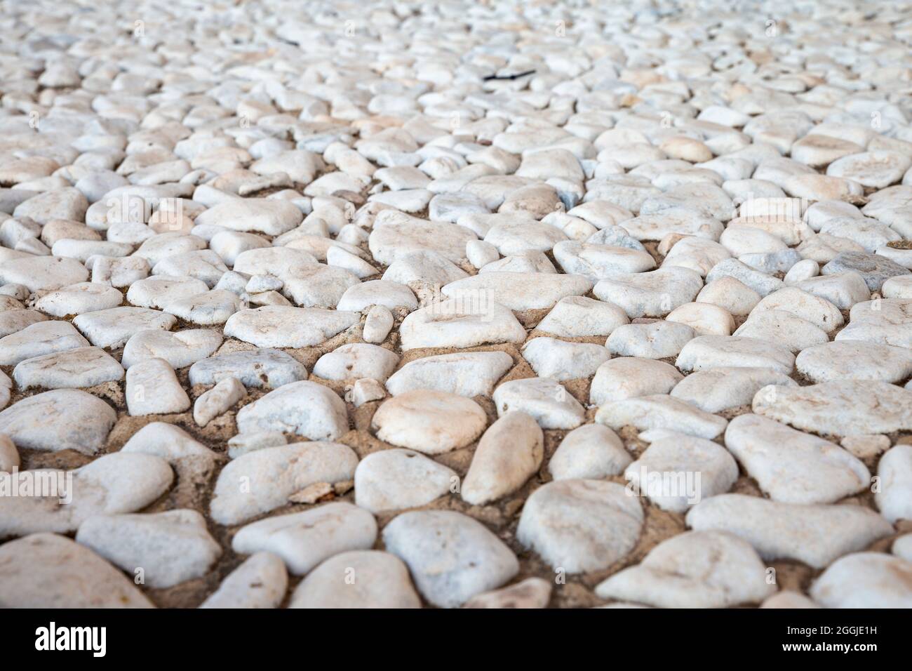 old cobblestone floor to cover the artificial river bed Stock Photo - Alamy