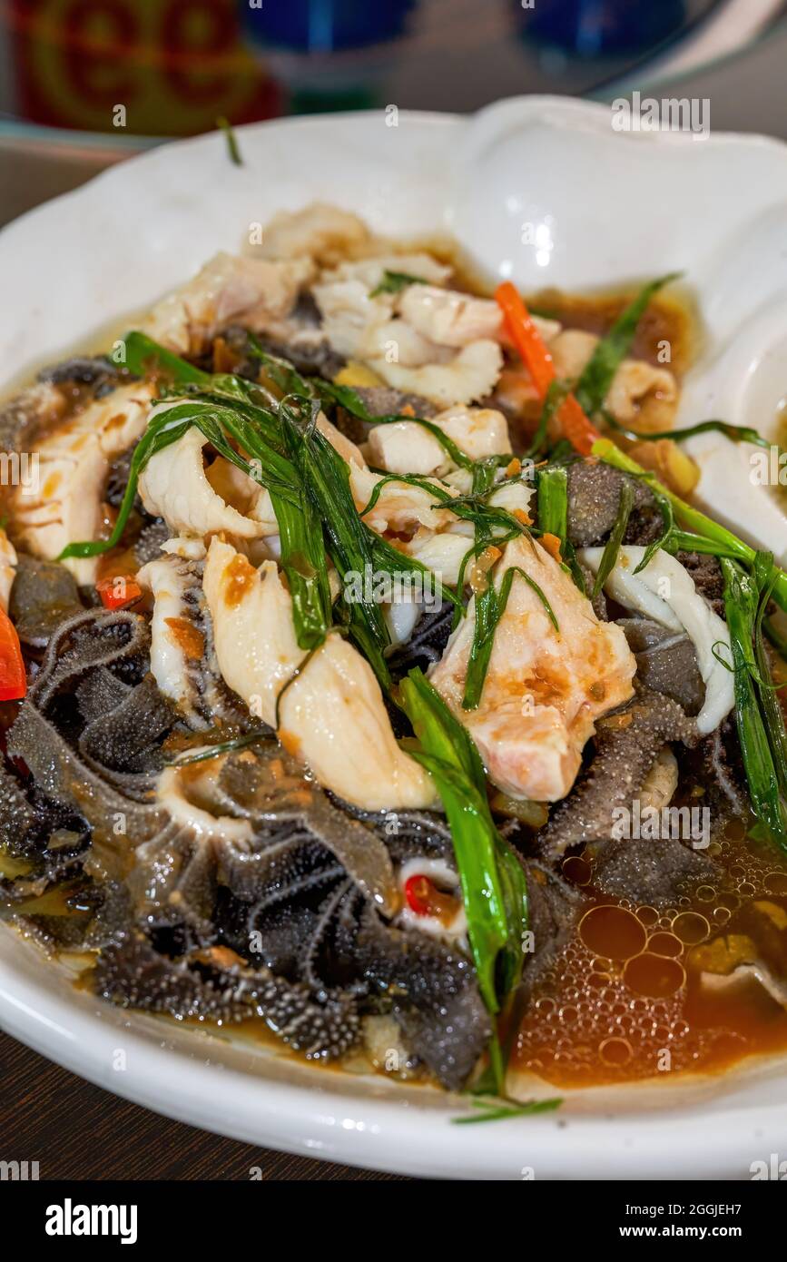 A delicious Chinese dish, boiled tripe and sirloin with film and beef ...