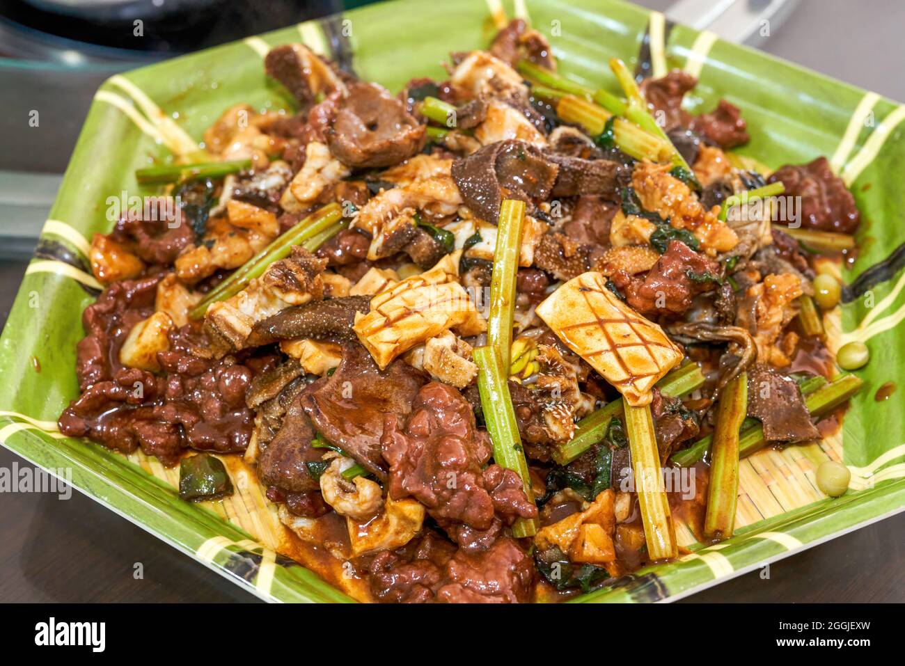A delicious Chinese dish, stir-fried beef offal and beef Stock Photo ...