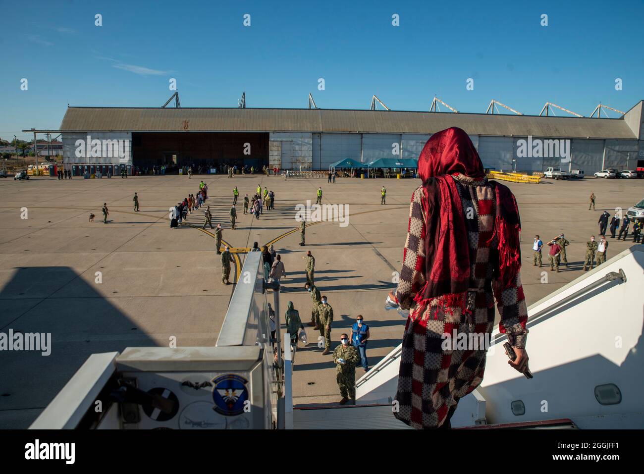 NAVAL STATION ROTA, Spain (Aug. 30, 2021) An evacuee from Afghanistan ...