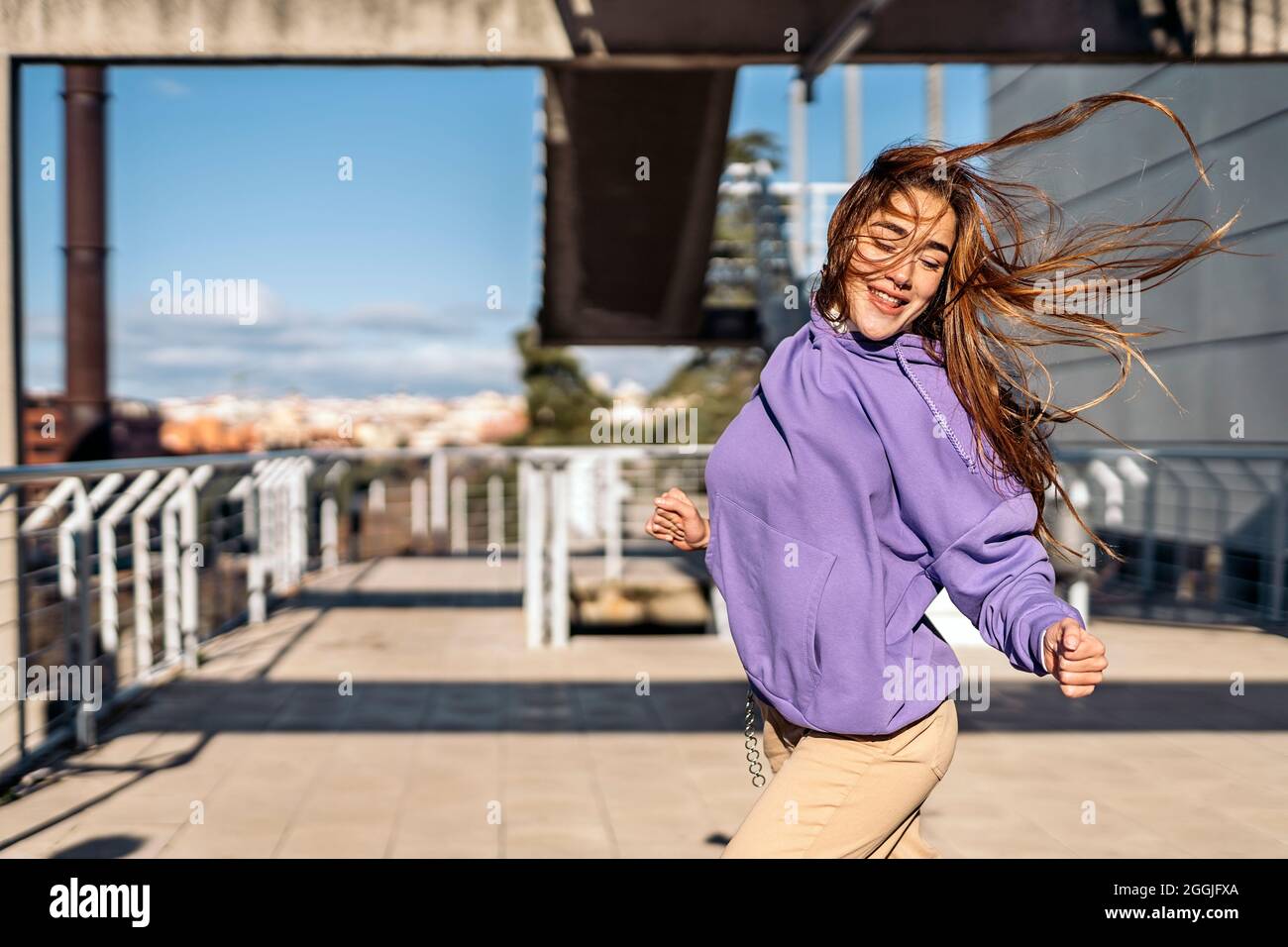 Stock photo of happy young girl dancing and having fun Stock Photo - Alamy