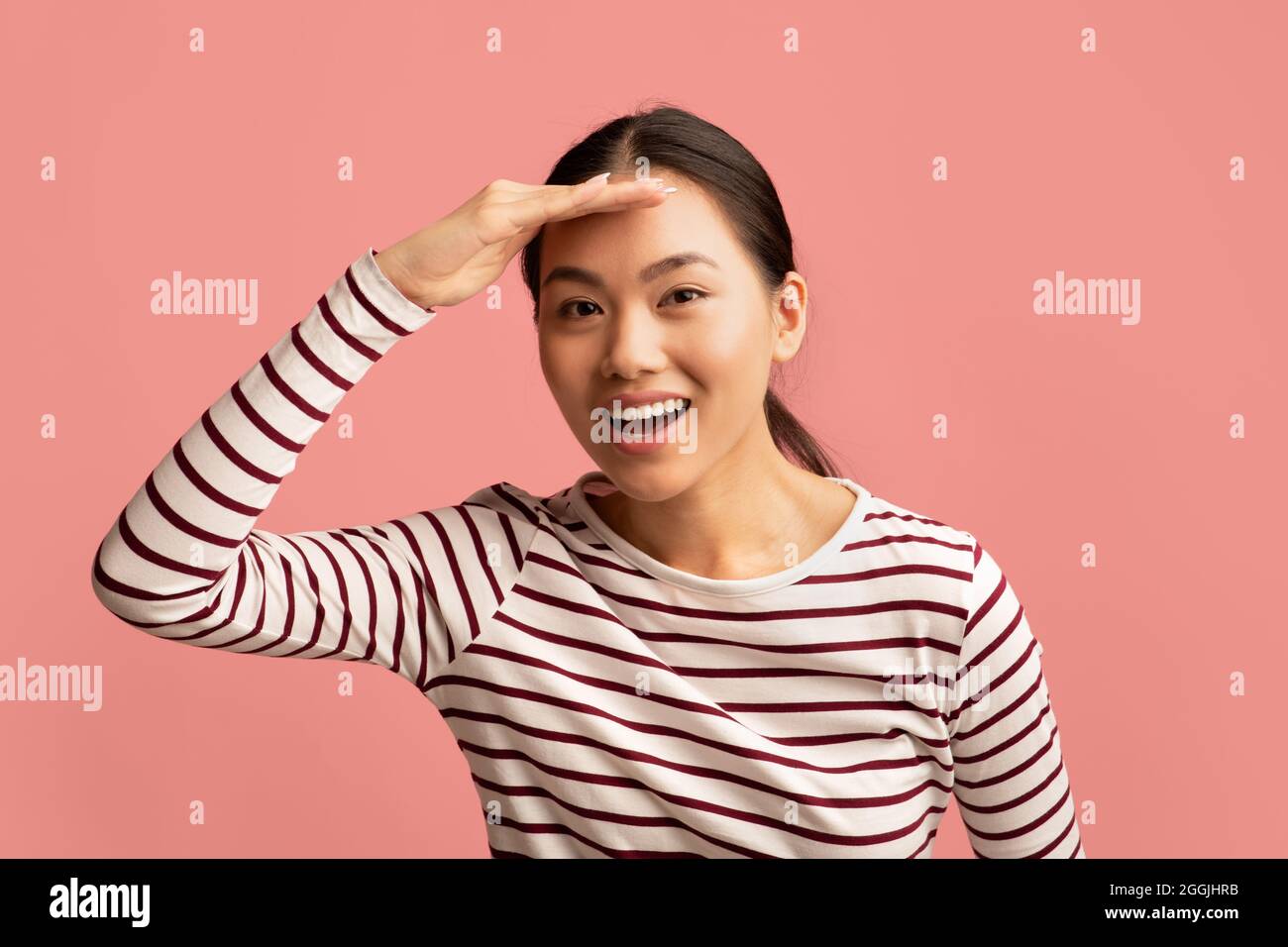 Amazed woman looking at hand hi-res stock photography and images - Alamy