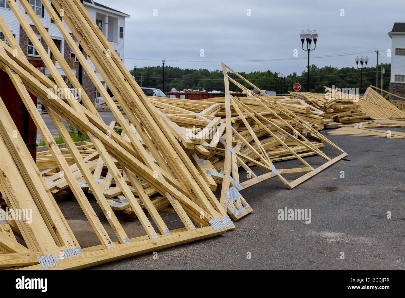 Wood stacked on house building materials from at a construction site ...