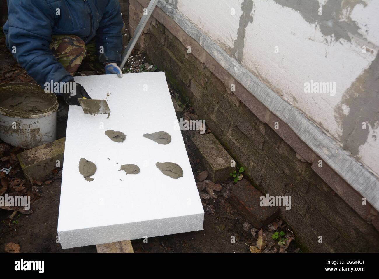 Contractor Insulating House Foundation with styrofoam insulation sheets ...