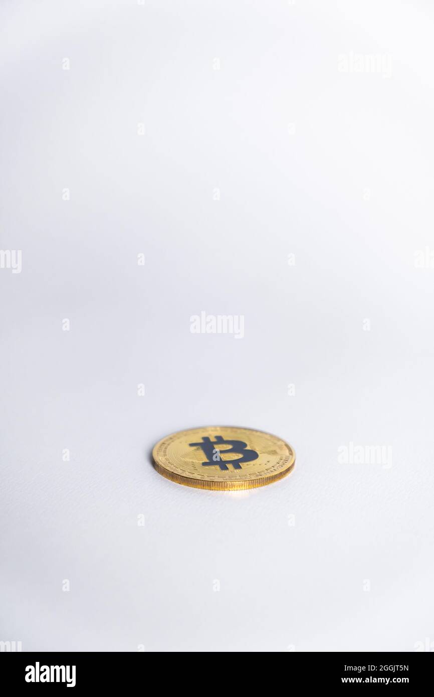One Bitcoin golden coin color with the letter "B" on Blue color, faced ...