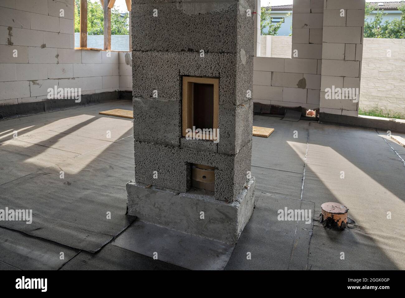 Construcion of chimney from concrete blocks Stock Photo - Alamy