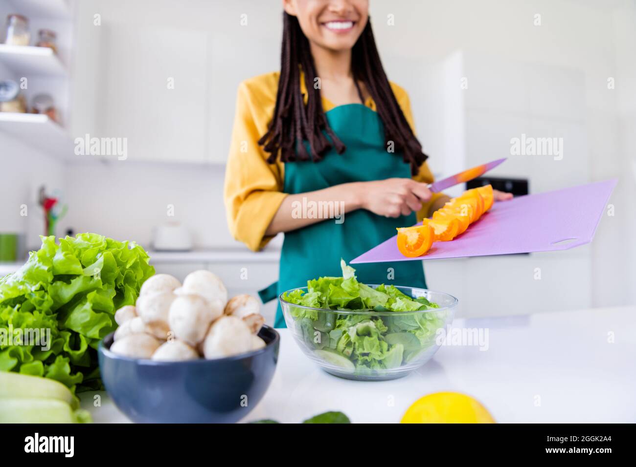 Photo of charming funny dark skin woman dressed yellow shirt cooking ...