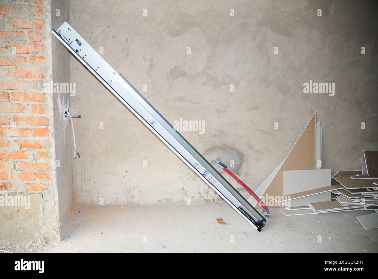 Install garage door opener springs system Stock Photo - Alamy