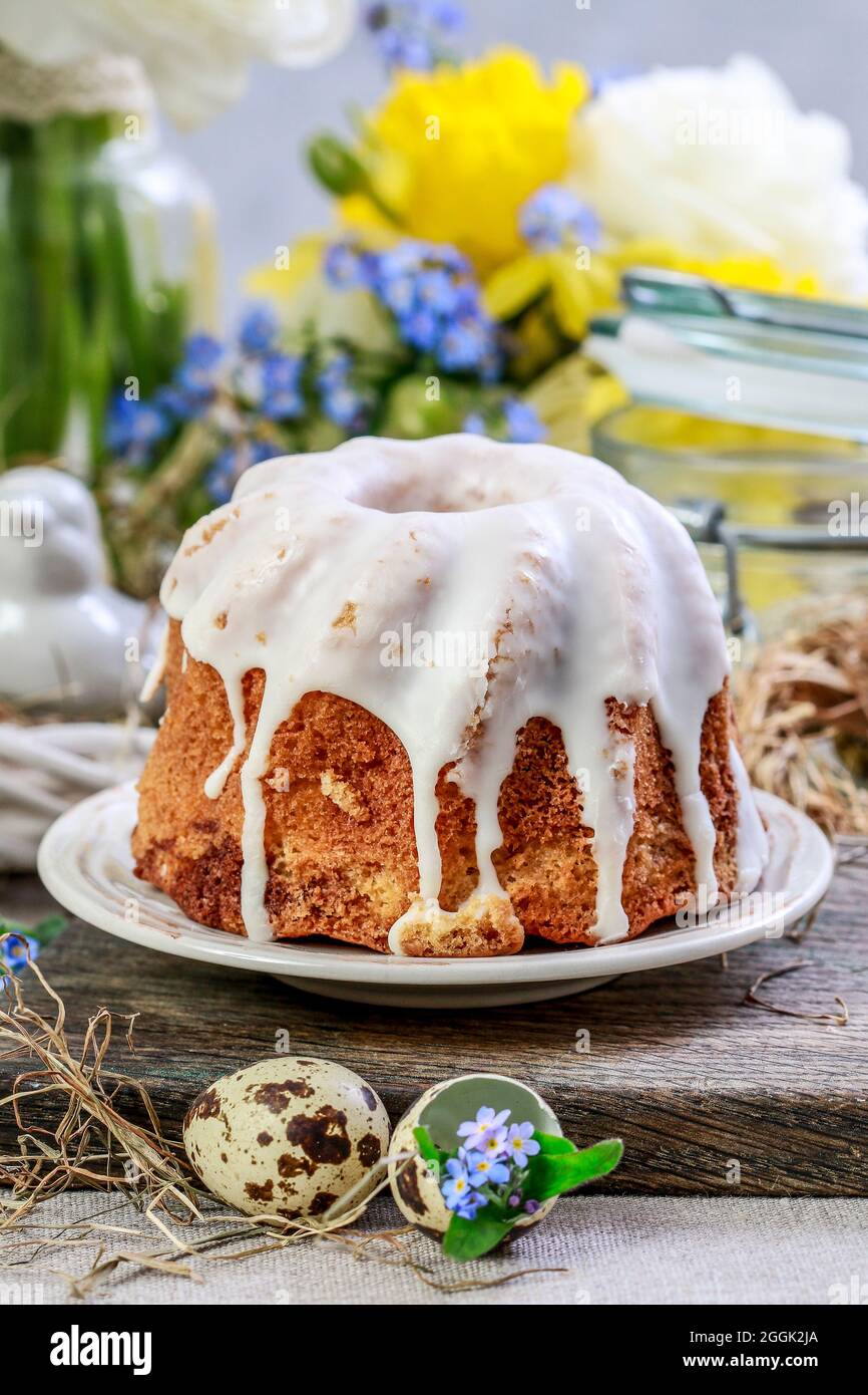 Traditional easter cake and seasonal table decorations. Festive time ...