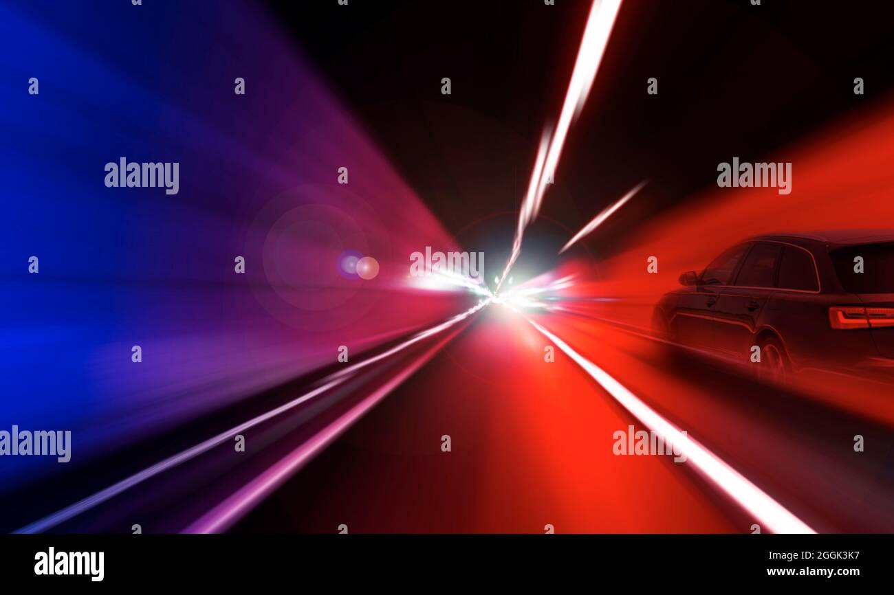 Cars rush through the tunnel in the beams of searchlights Stock Photo ...