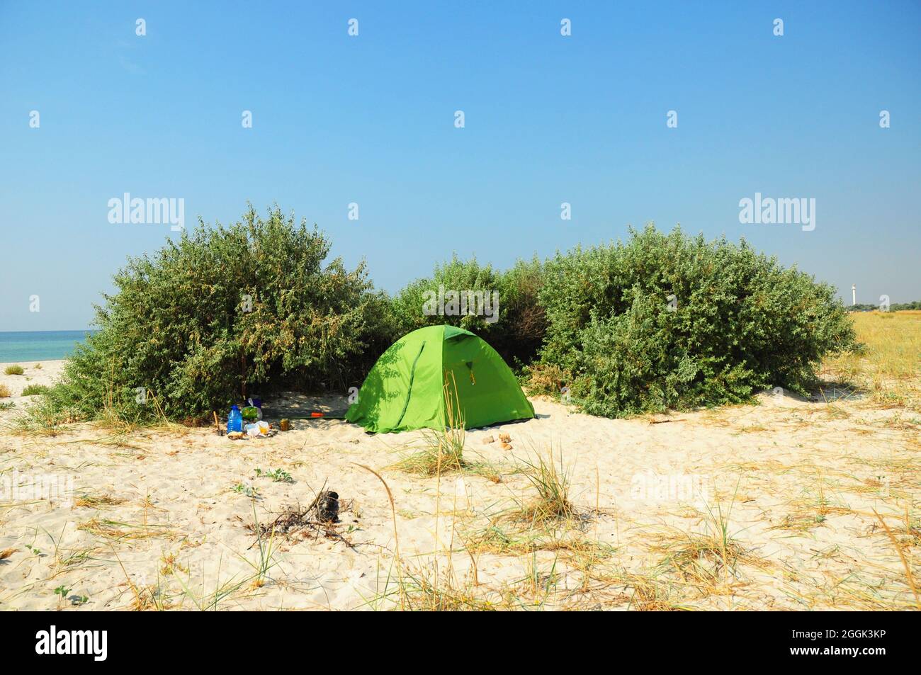 Tourist tent in the beautiful inspiring sea beach. Camping Tent on the ...