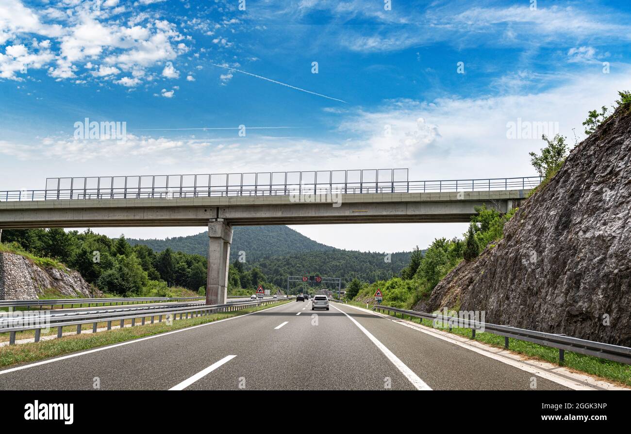 Highway bridge and cars on the road Stock Photo - Alamy